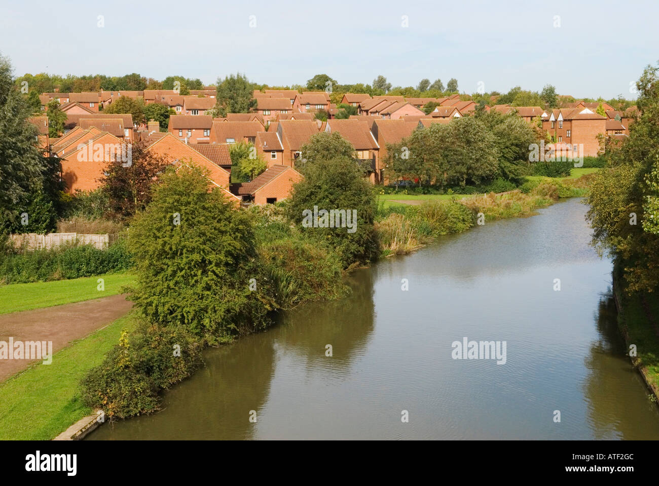 Milton Keynes new town, the Grand Union canal. Traditional modern red ...