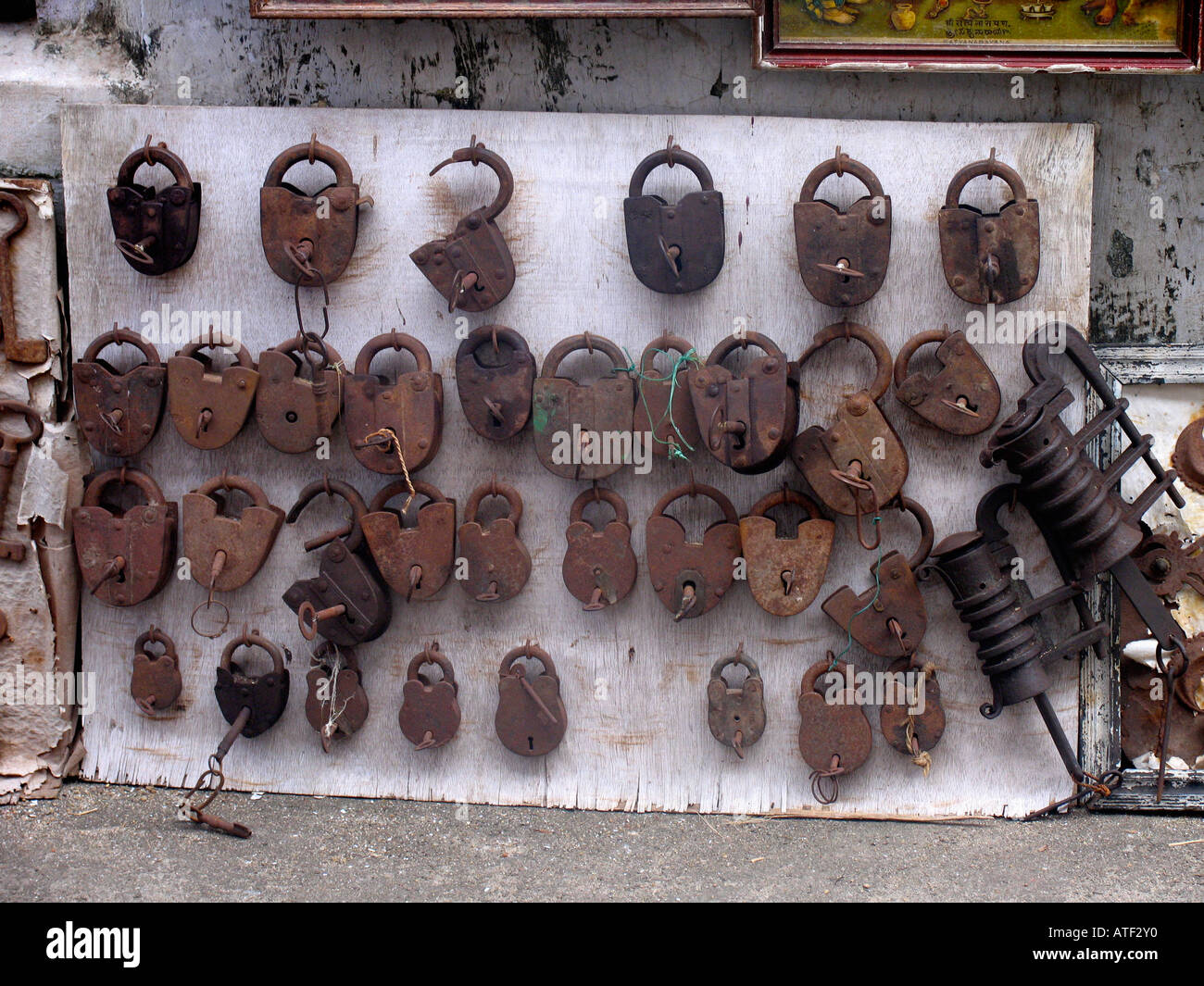 An ancient locks on a display board outside of antique piece seller ...