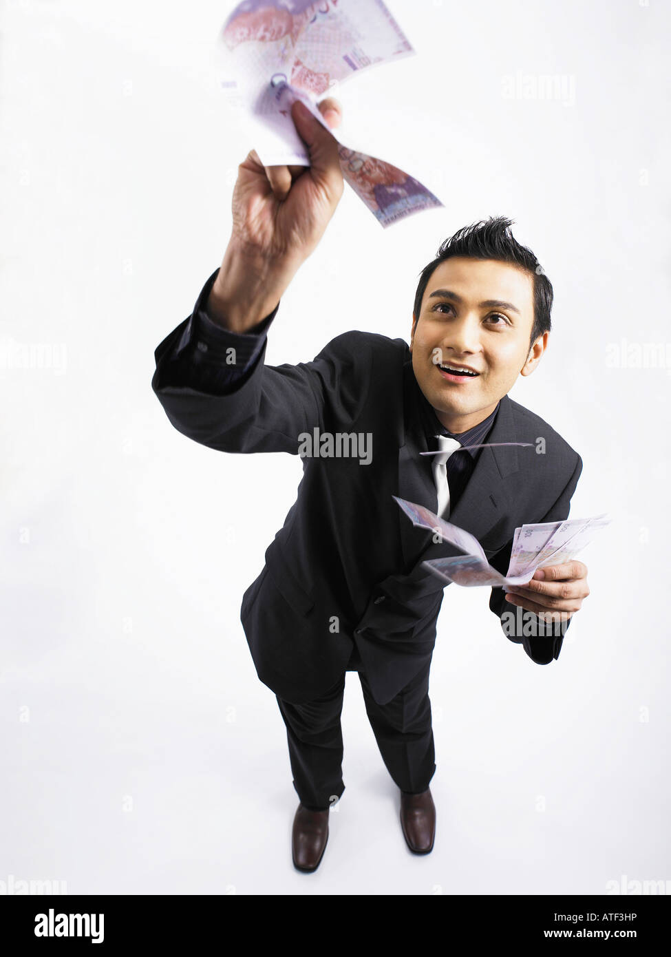 Grabbing riches hi-res stock photography and images - Alamy
