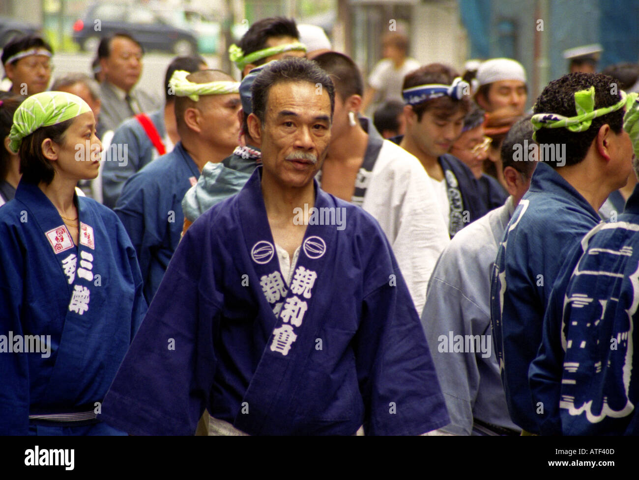 Participants of Sanno Matsuri Festival in historic clothing parading ...