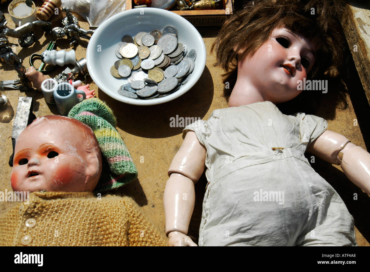 old dolls, coins Stock Photo - Alamy
