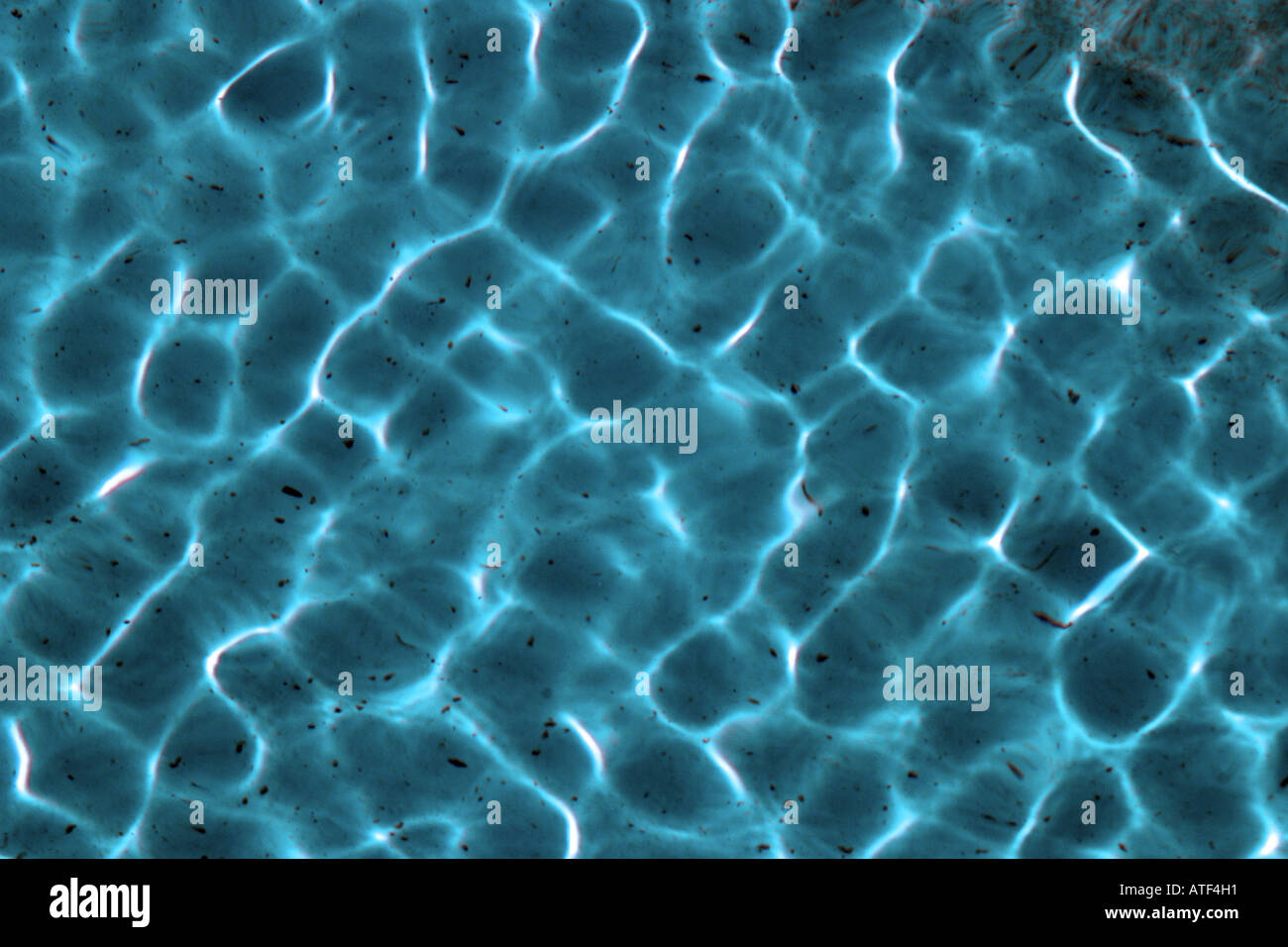 swimming pool water surface reflecting light Stock Photo - Alamy