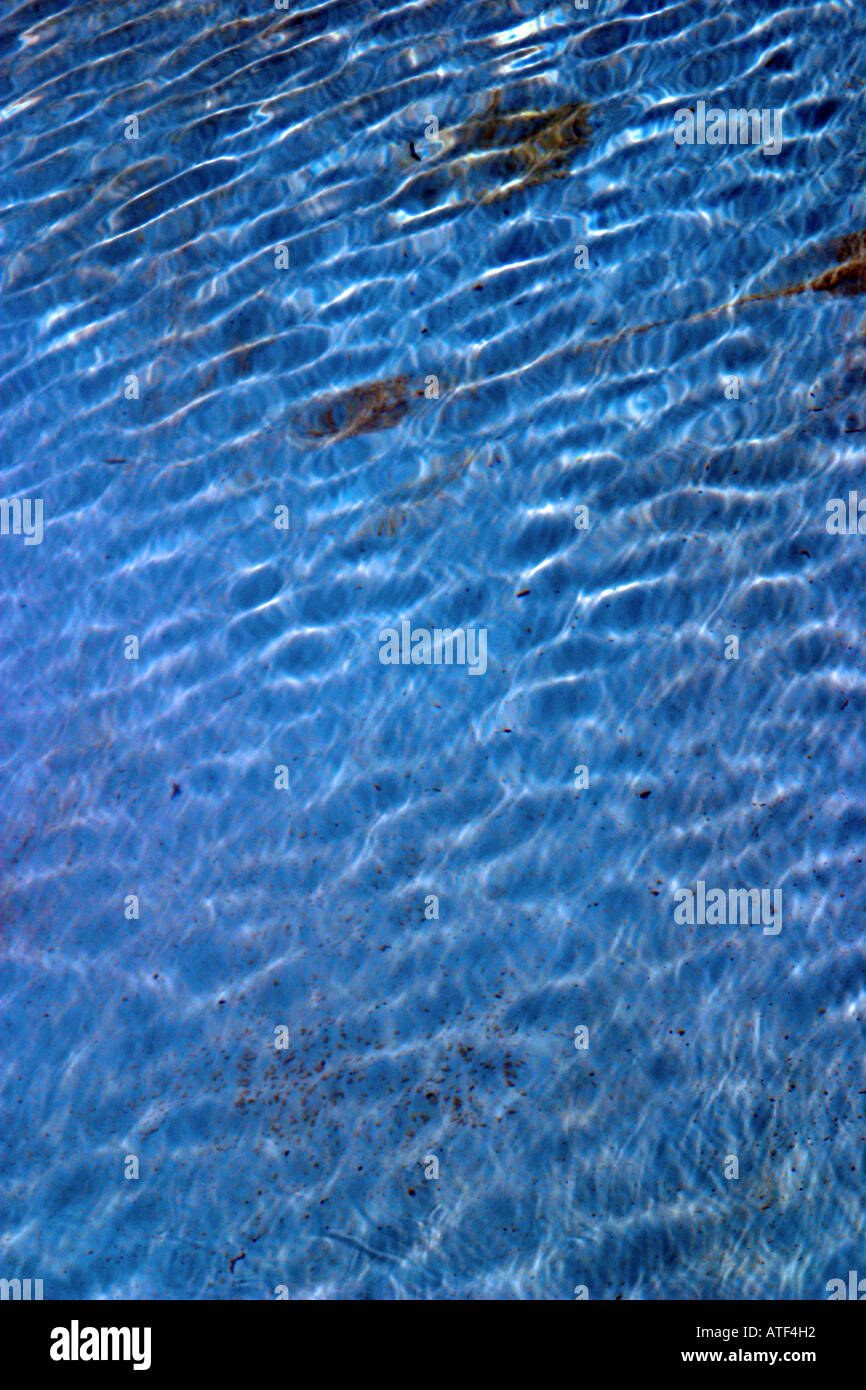 swimming pool Water surface reflecting light Stock Photo - Alamy