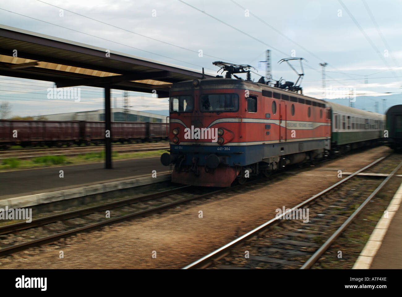 Train Locomotive Pulling Out of a Train Station Stock Photo - Alamy