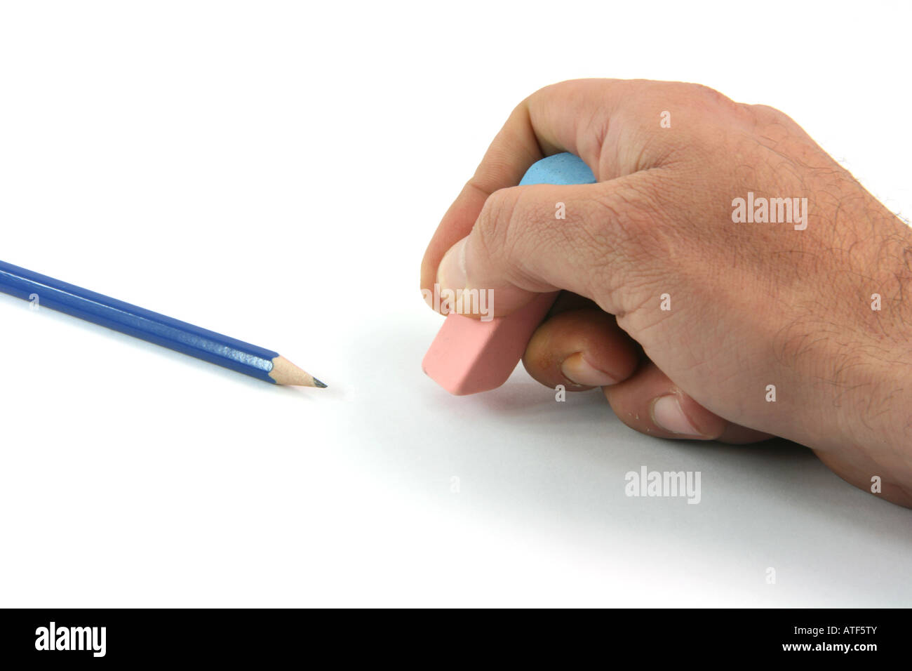 business concepts erasing mistakes and black pencil isolated on white ...