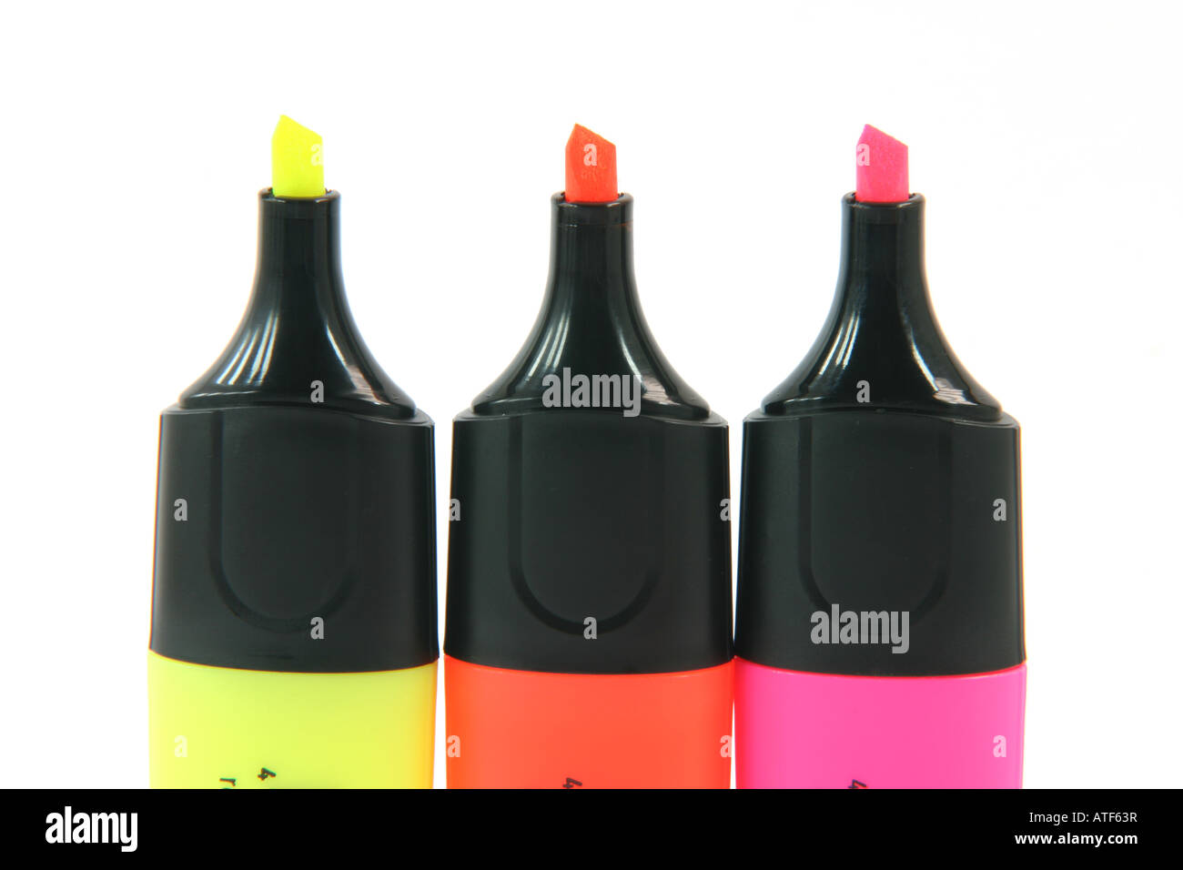 stationery and business objects three highlighters isolated on white ...