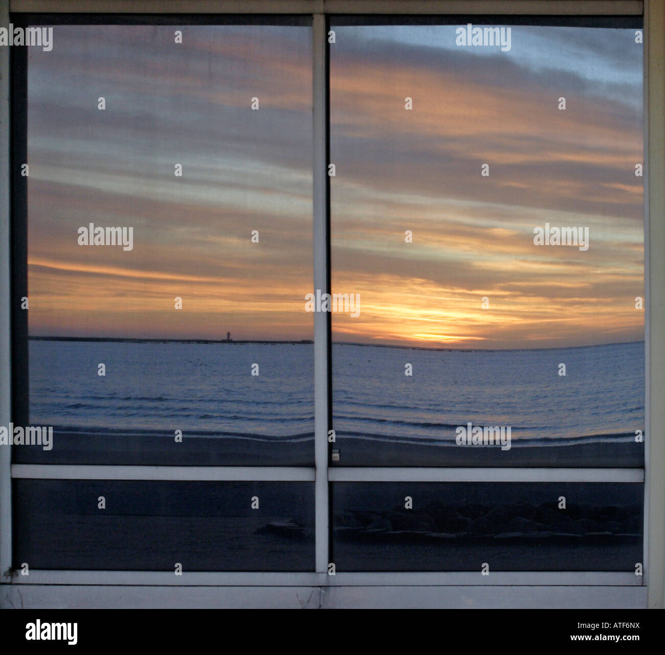 Mirror image of the sunset Stock Photo - Alamy