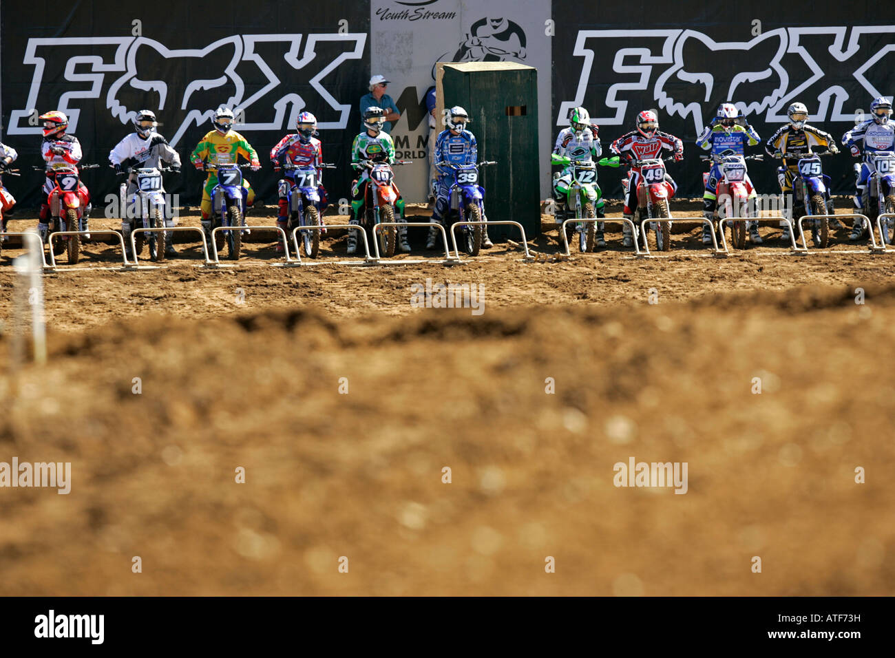 A Motocross MX racers ready on the start line Stock Photo - Alamy