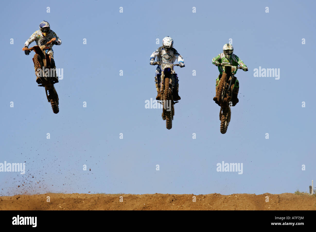Motocross MX racers in action Stock Photo - Alamy