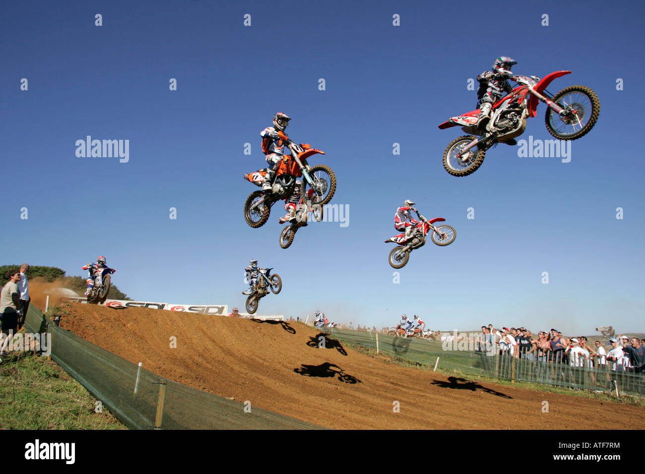 Motocross MX racers in action Stock Photo - Alamy
