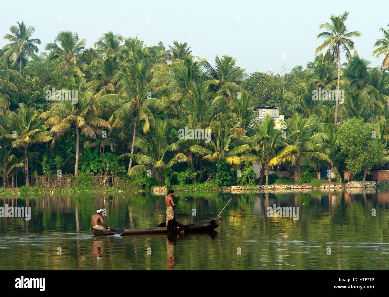 local indian fisherman on the kerala backwaters south india Stock Photo ...