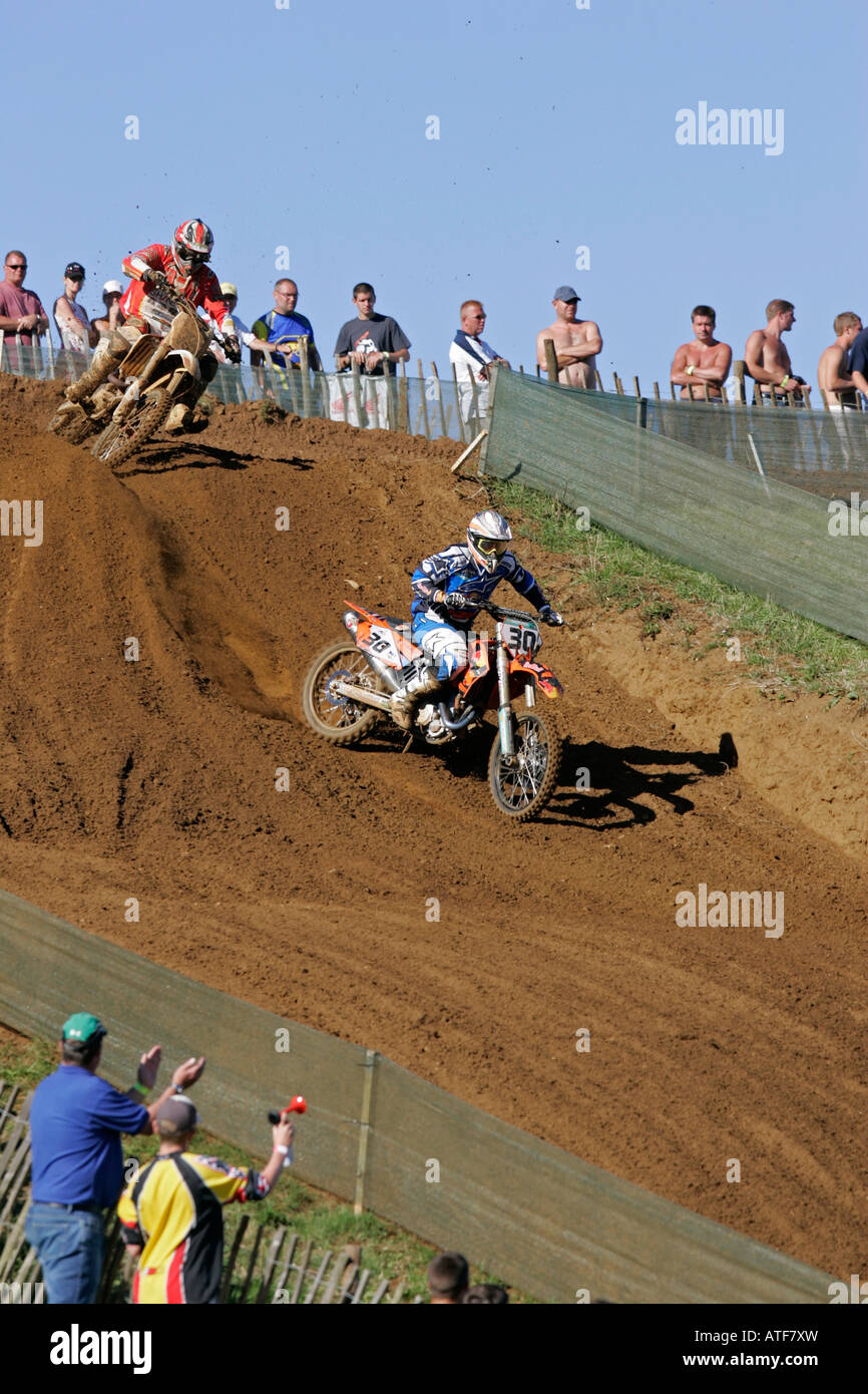 Motocross MX racers in action Stock Photo - Alamy