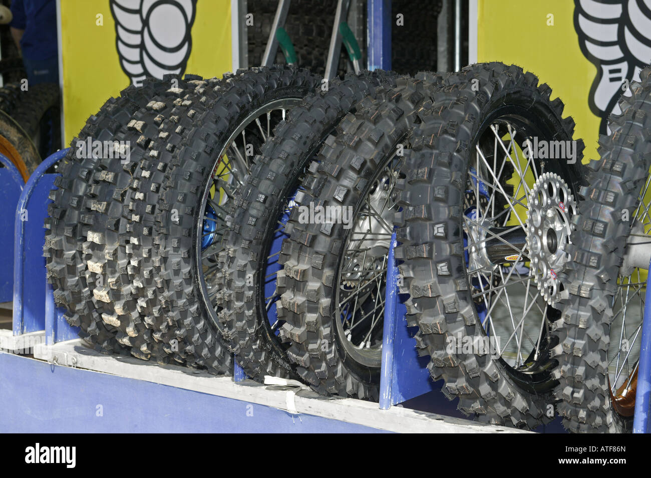 A Motocross MX racer tyres in a rack Stock Photo - Alamy