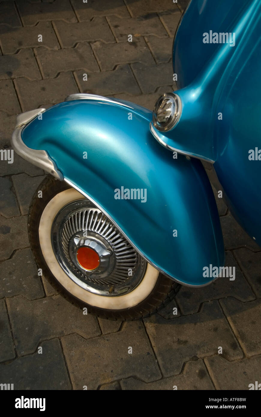 Close up of Blue motor scooter with white walled tyre Stock Photo - Alamy