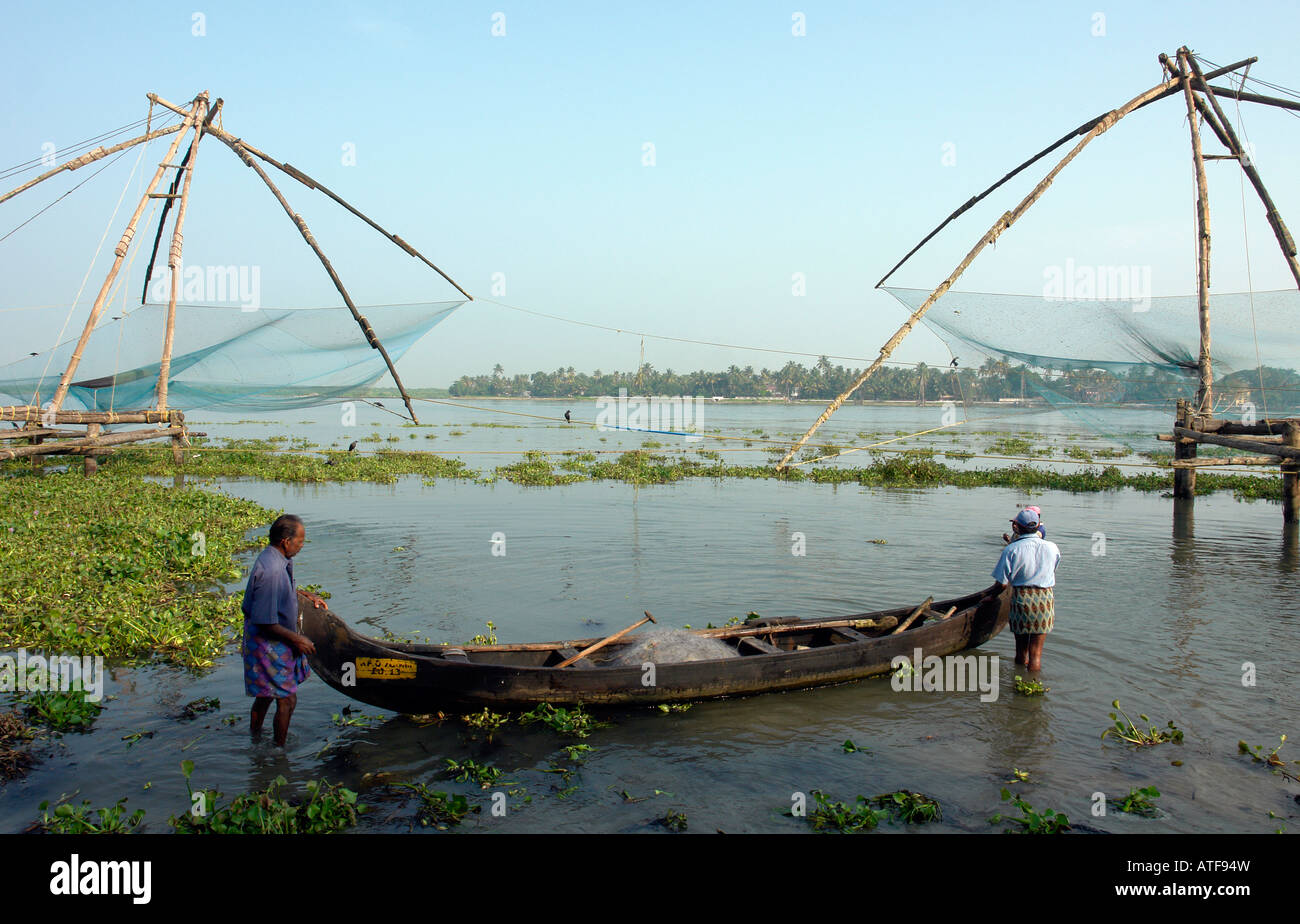 indian fisherman with small traditional boat returning from a nights ...