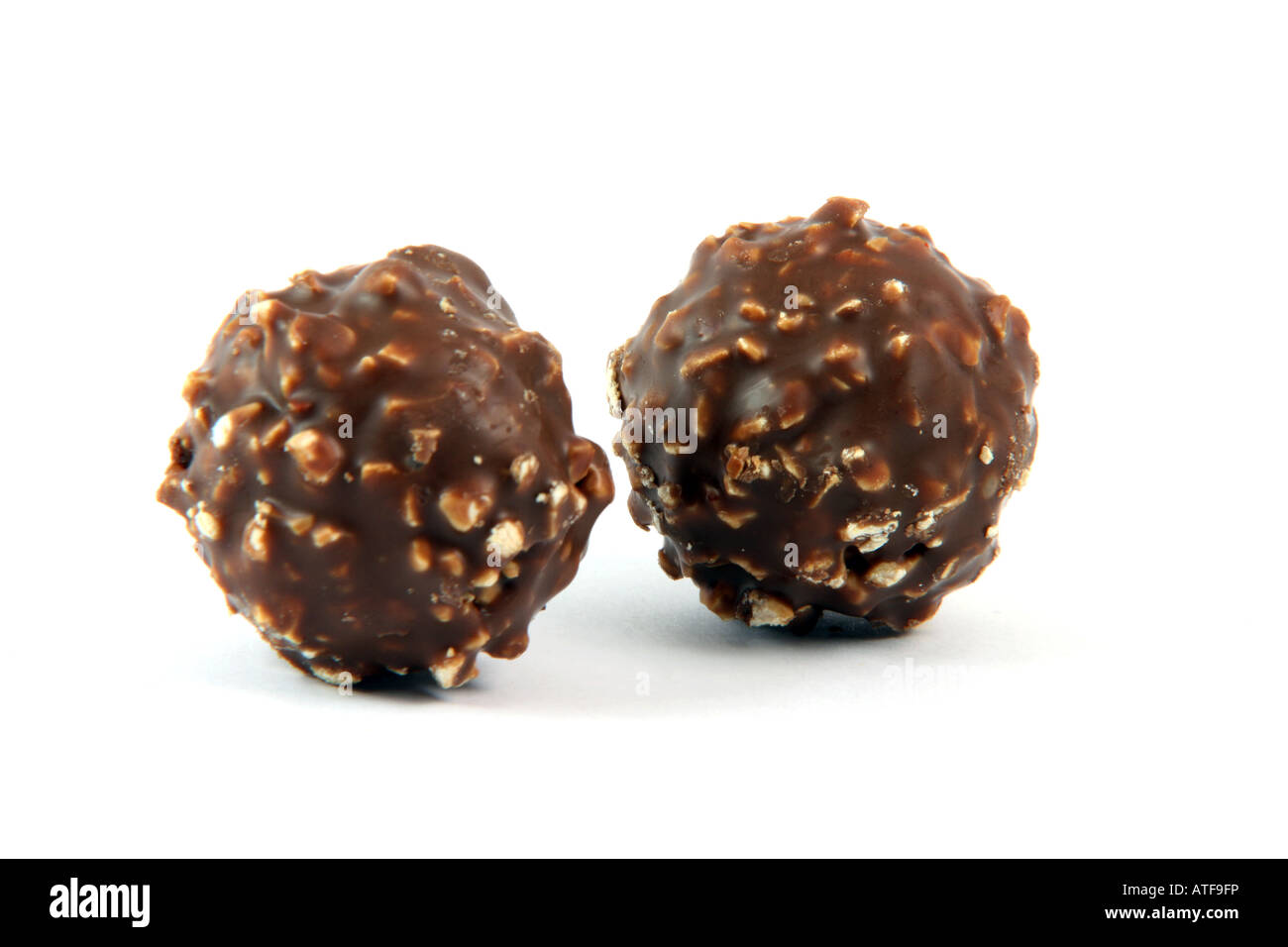 two choclates isolated on white background food and sweets concepts ...