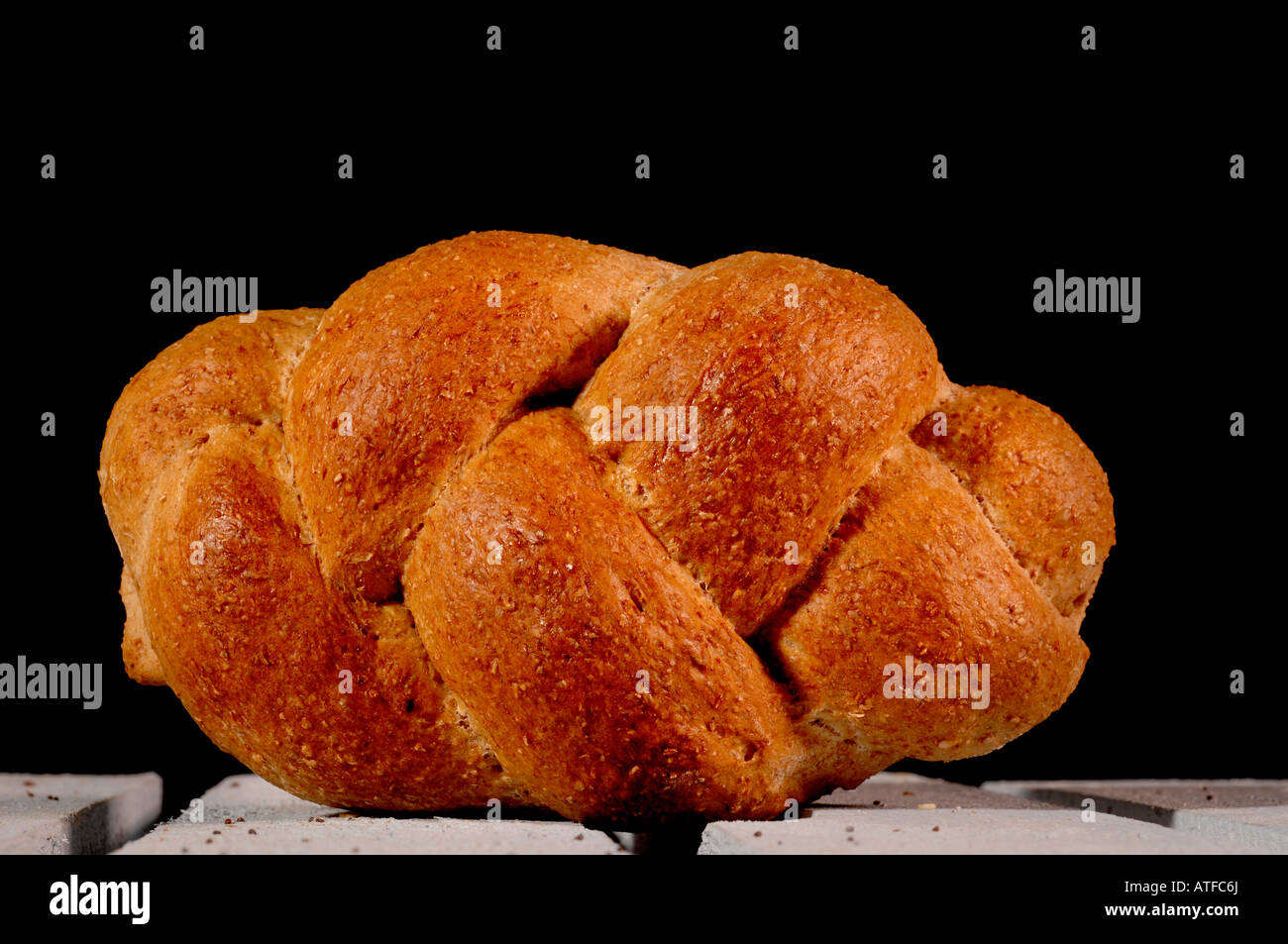 a knotted rustic traditionally baked bread loaf Stock Photo - Alamy