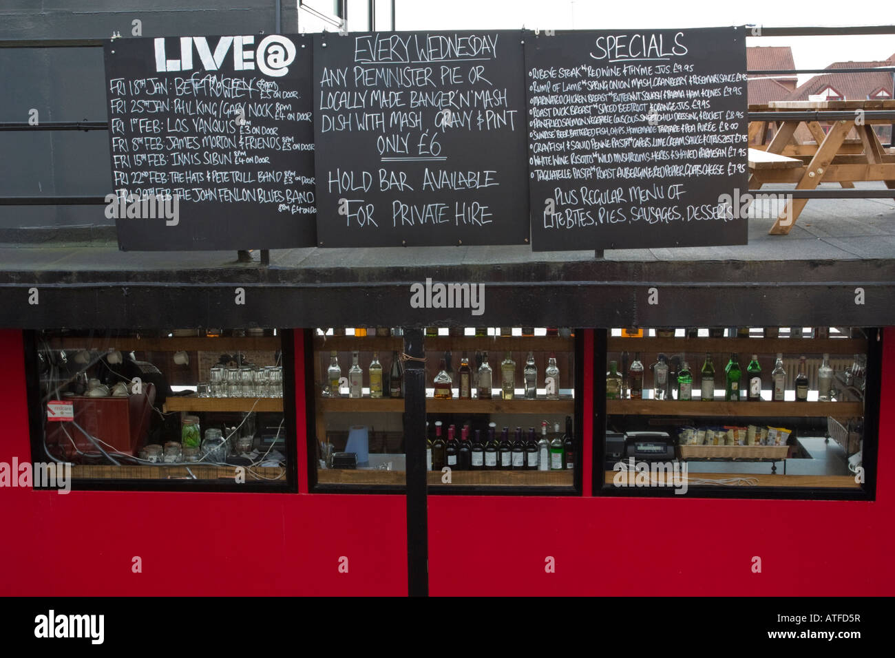 A floating Bar on Bristols waterfront With Bottles in the windows ...