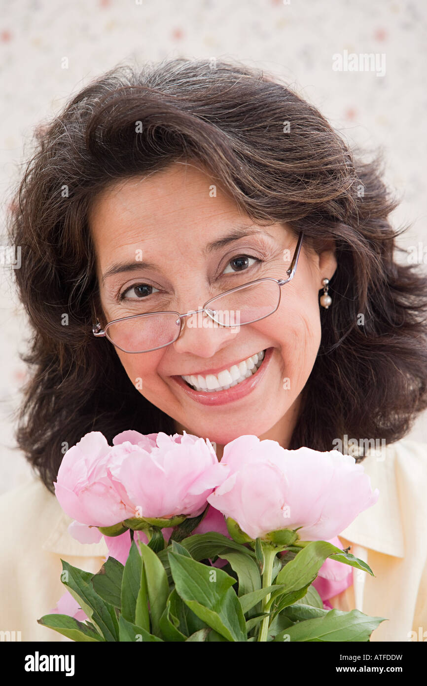 Woman with flowers Stock Photo - Alamy