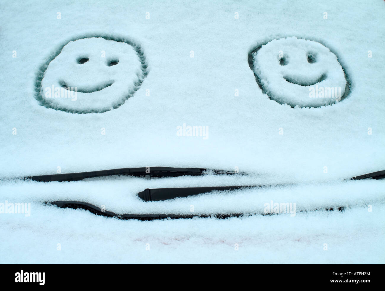 Snow motoring winter smileys faces Stock Photo - Alamy