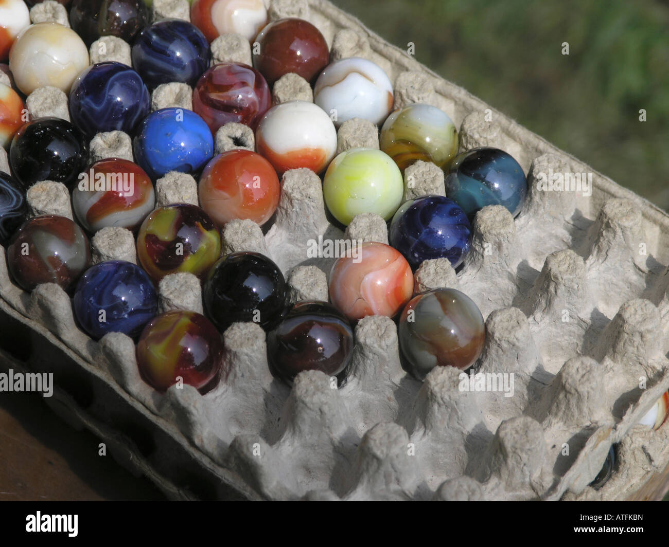 Marbles a children's games played with glass balls which have now ...