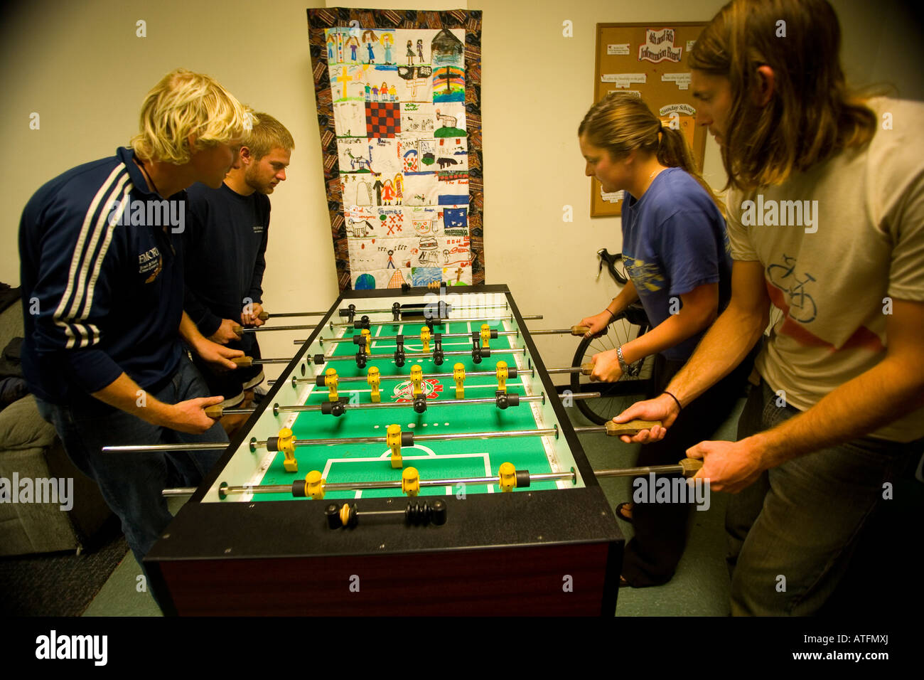 Kids playing indoor football hi-res stock photography and images - Alamy