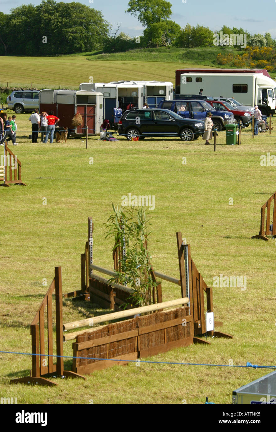 View of country show with showjumping Stock Photo - Alamy