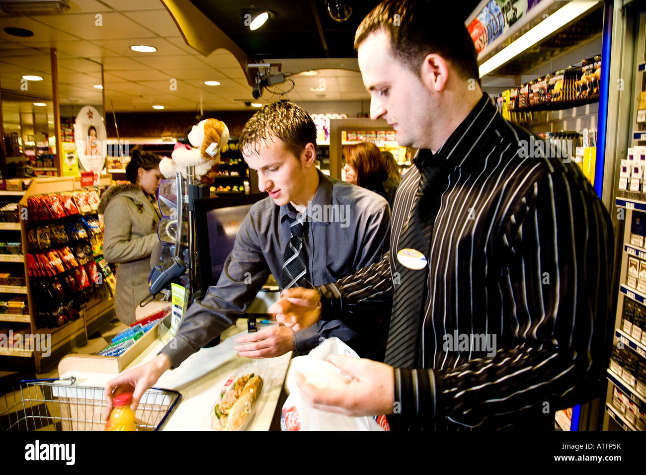 Images of Supermarket staff being trained in the various tasks involved ...
