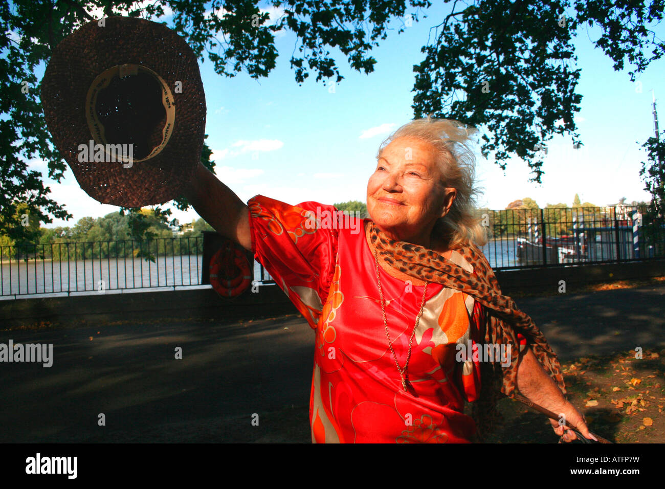 old lady having fun and full of life Stock Photo - Alamy