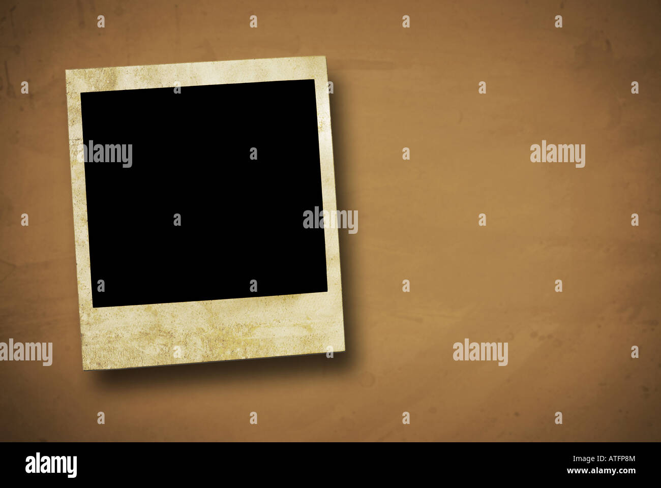 Vintage instant film frame on old and rusty background with a frayed ...