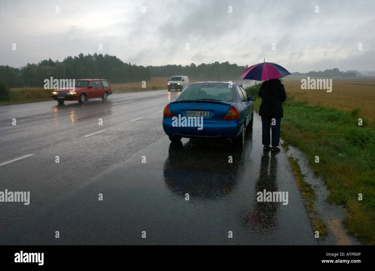 Car rain umbrella hi-res stock photography and images - Alamy