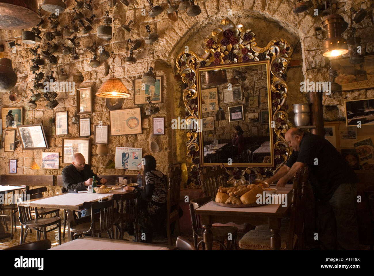 People eat in "Dr Shakshuka" a restaurant serving traditional Libyan ...