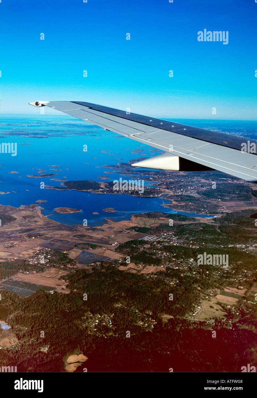 View trough the window of an airplane Stock Photo - Alamy