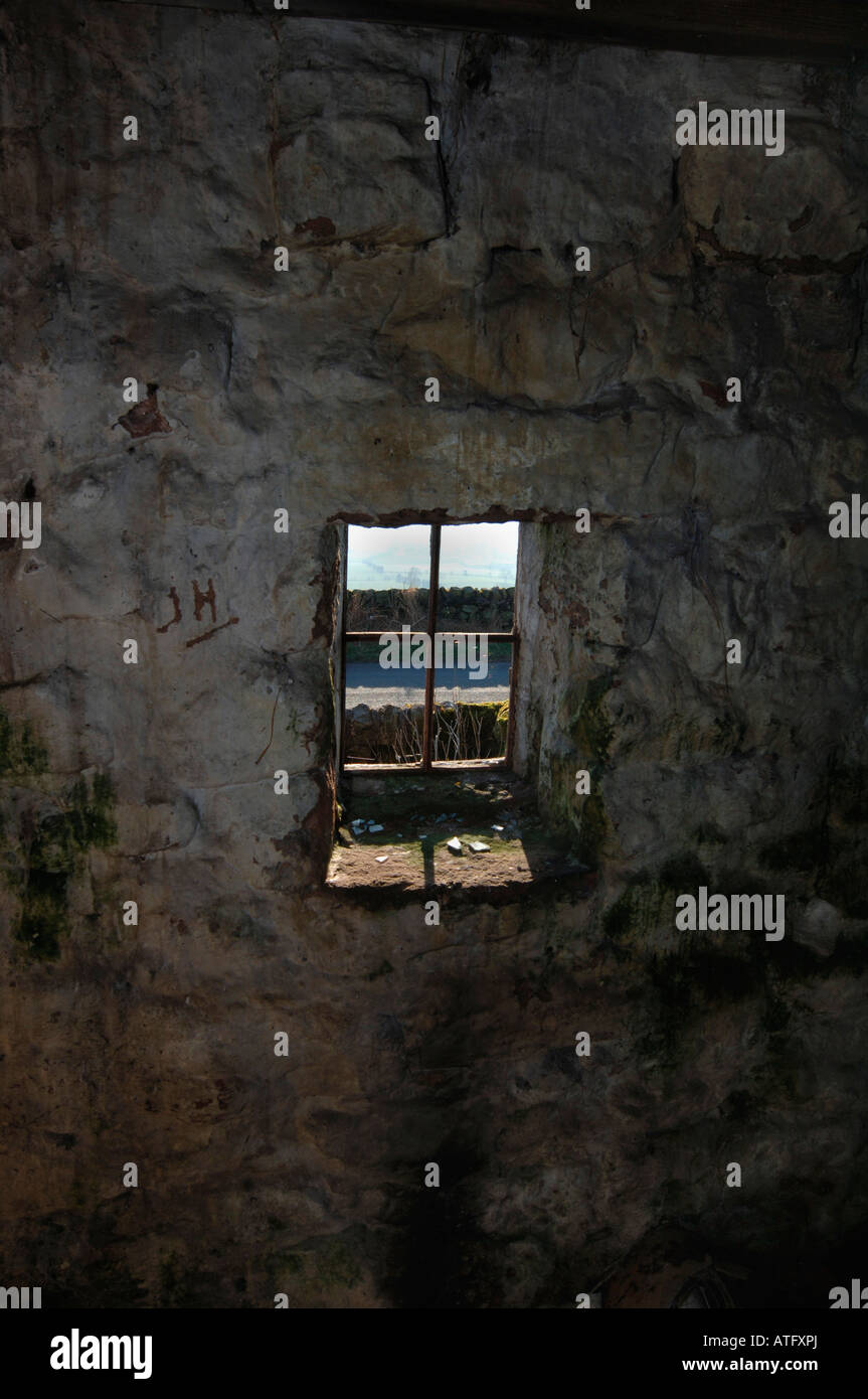 A Small Window Inside A Derelict Property Stock Photo - Alamy