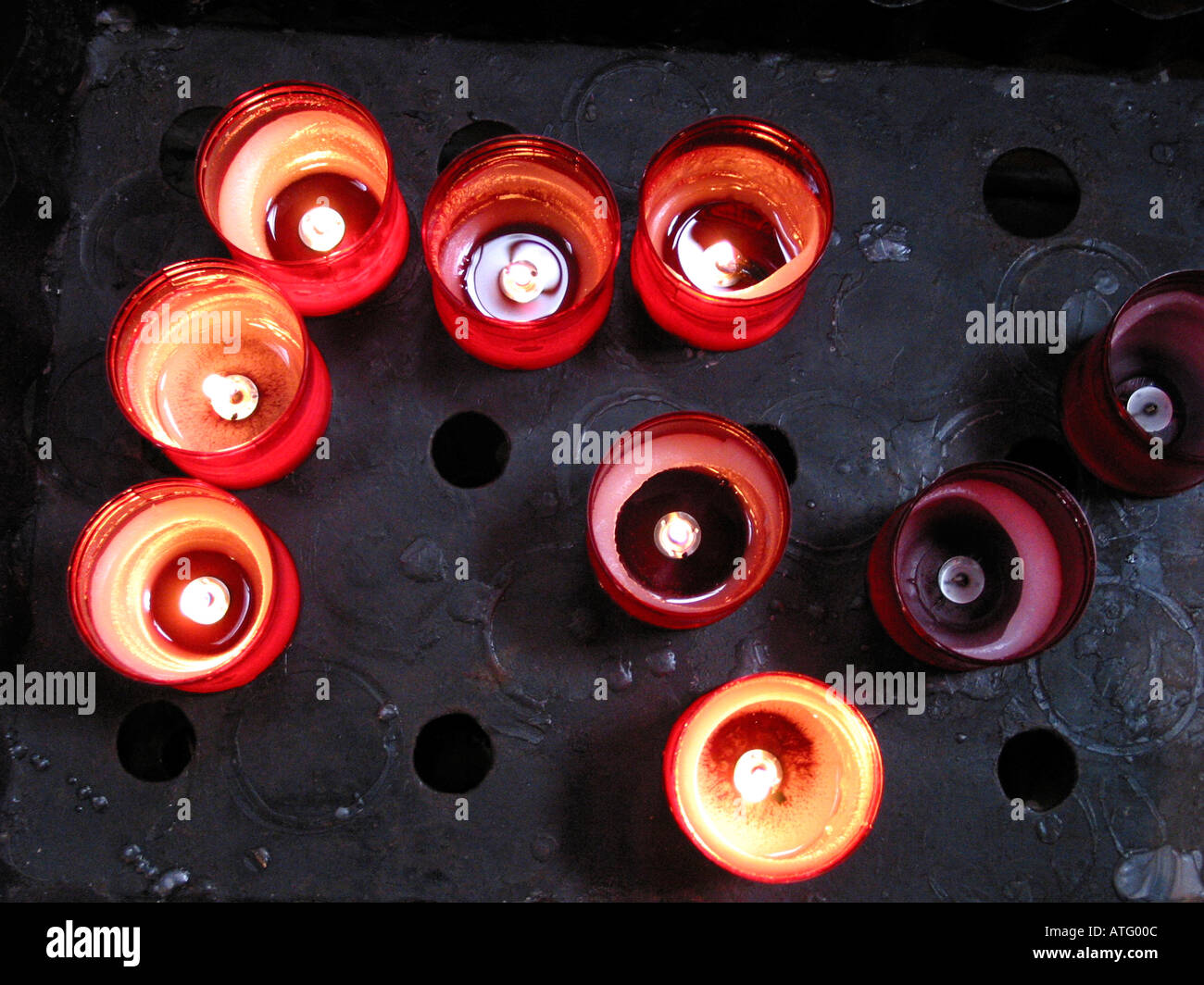 Red candles in a Catholic church altar Stock Photo - Alamy