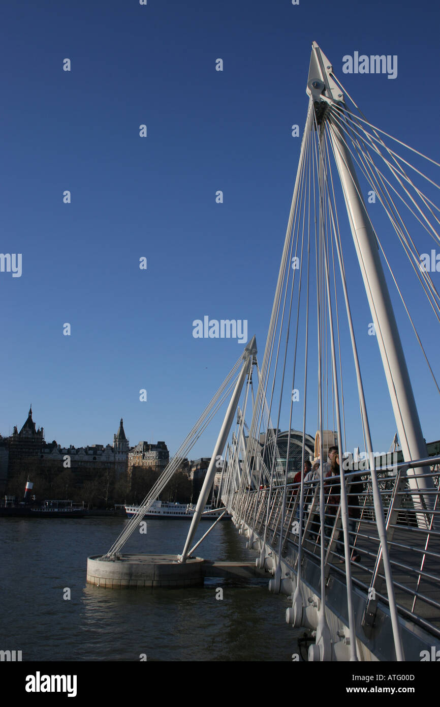 Golden Jubilee Pedestrian Bridge crossing the river Thames, London ...