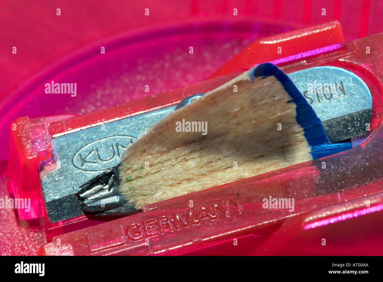 Pencil being sharpened Stock Photo - Alamy