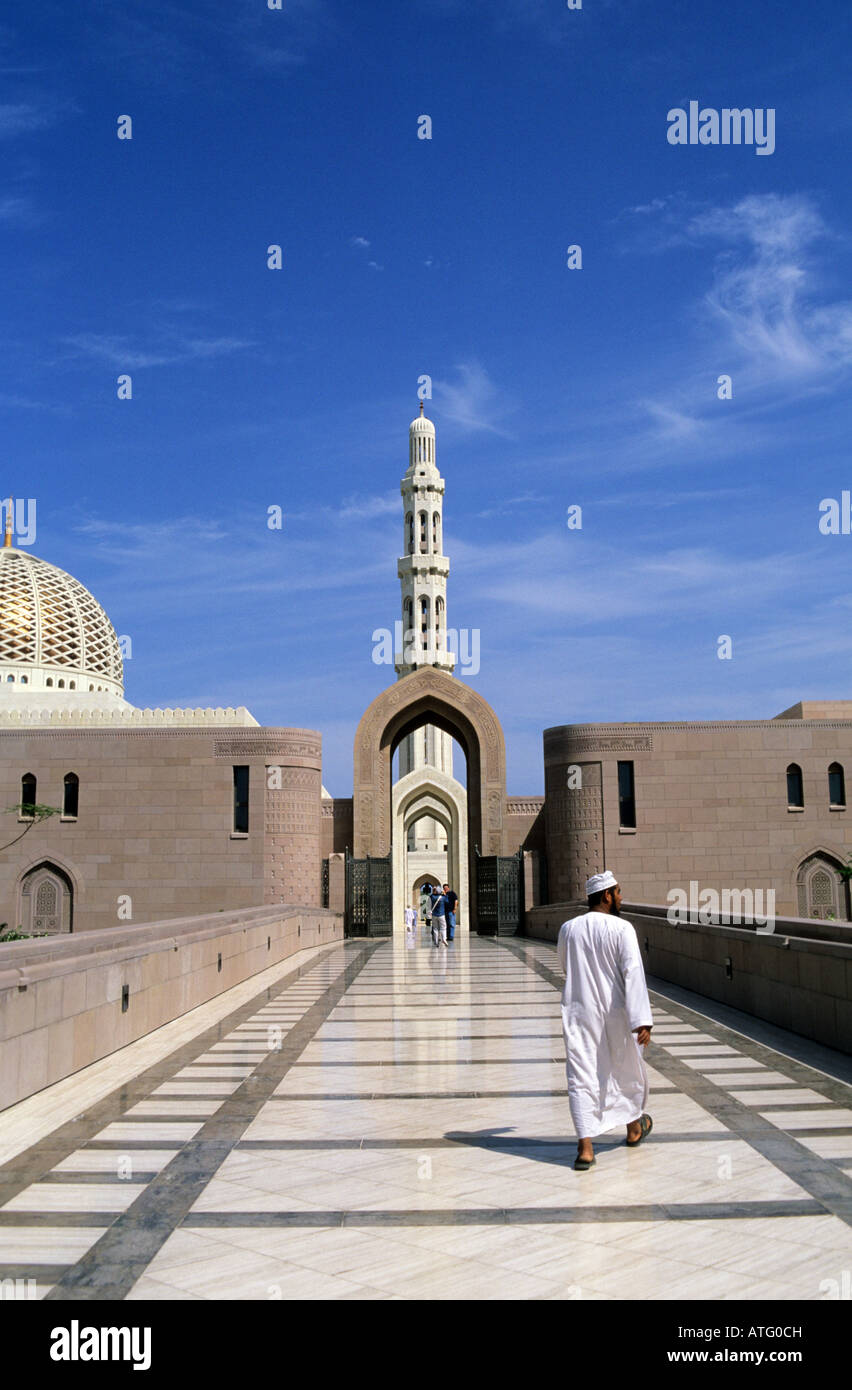 Main entrance to the Sultan Qaboos Mosque, with traditionally dressed ...