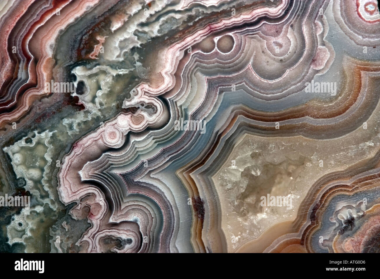 Slice of agate showing colourful banding Stock Photo - Alamy