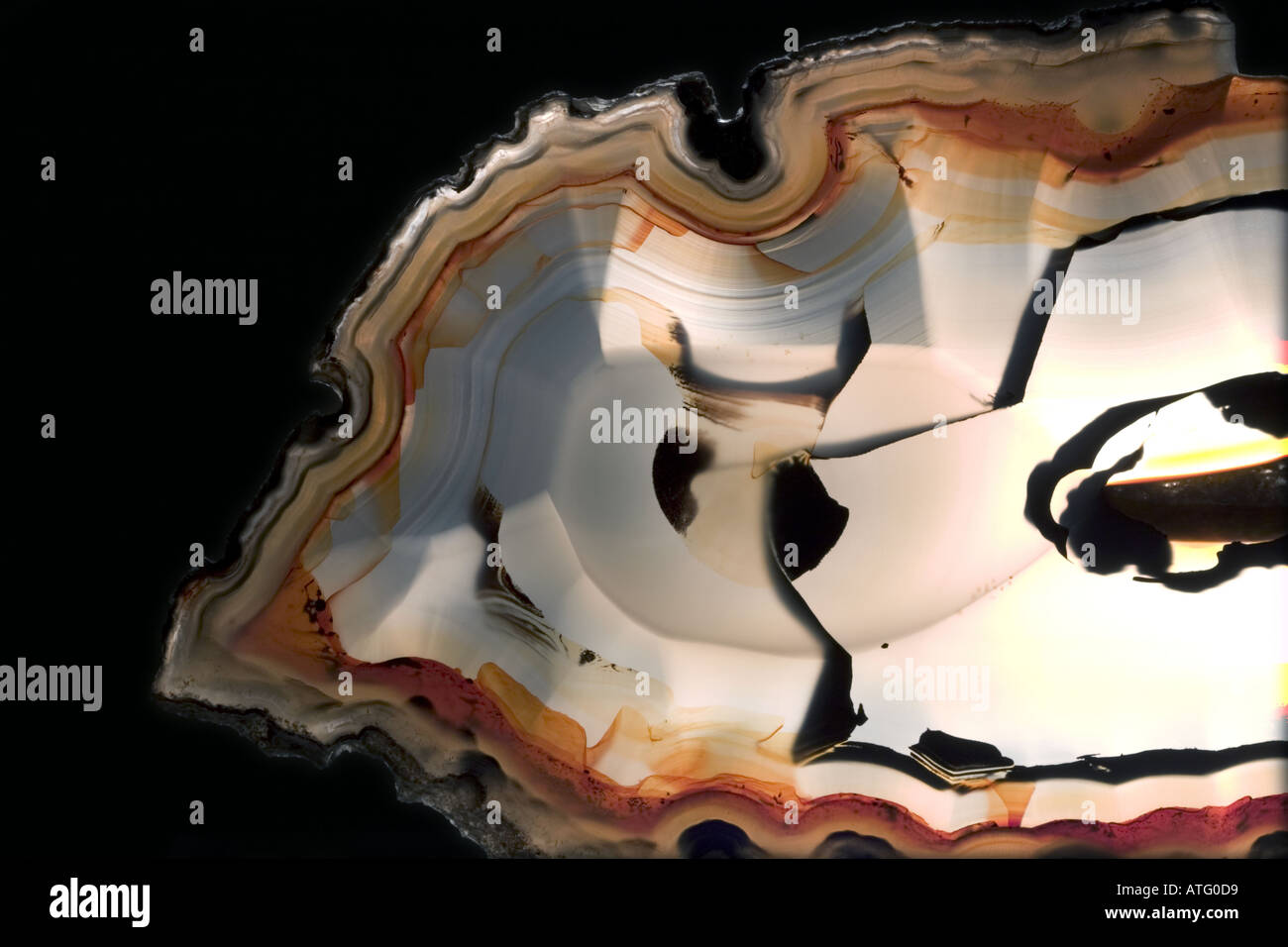 Slice of agate showing colourful banding Stock Photo - Alamy