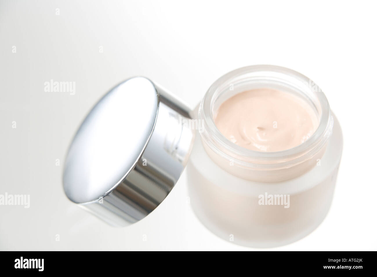 Pot of cosmetic foundation Stock Photo - Alamy