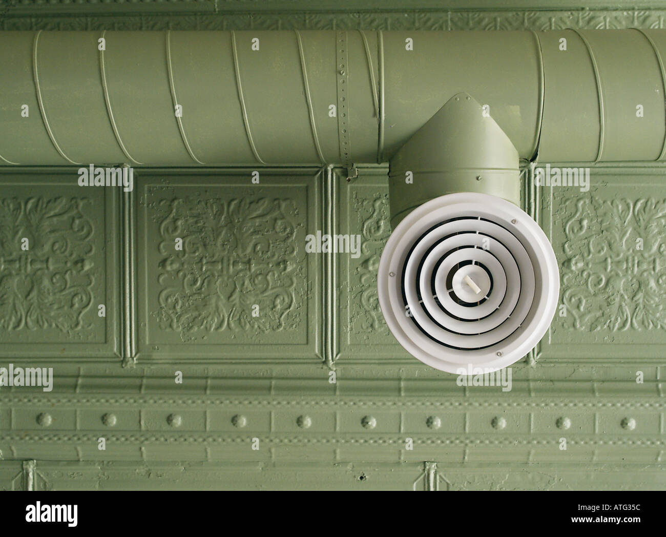 Detail of ceiling in a 100 year old building showing old forced air ...