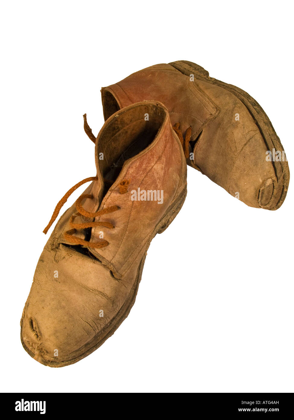 Old worn out working boots with holes Stock Photo - Alamy