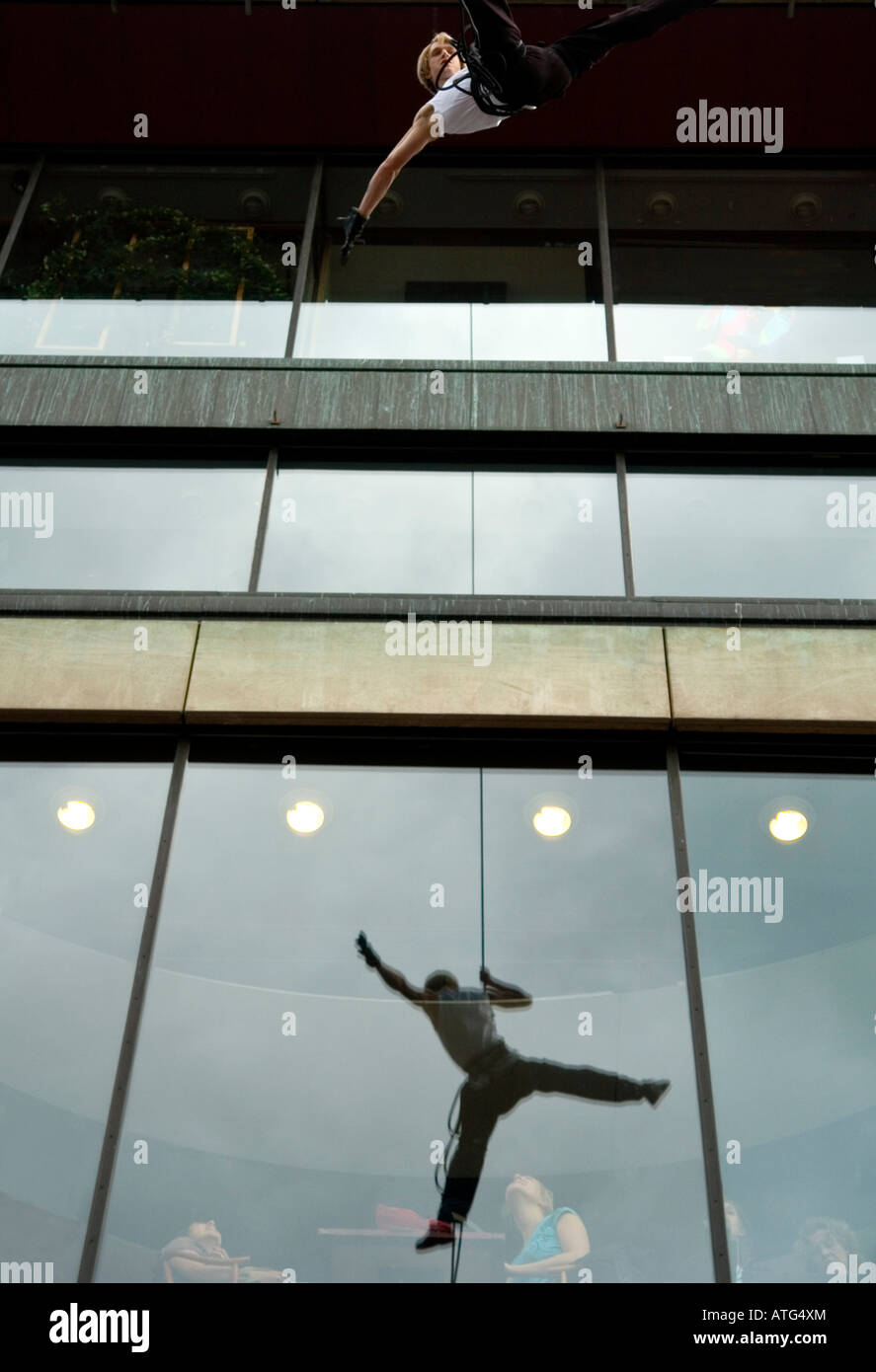 Climbing a house front Stock Photo - Alamy