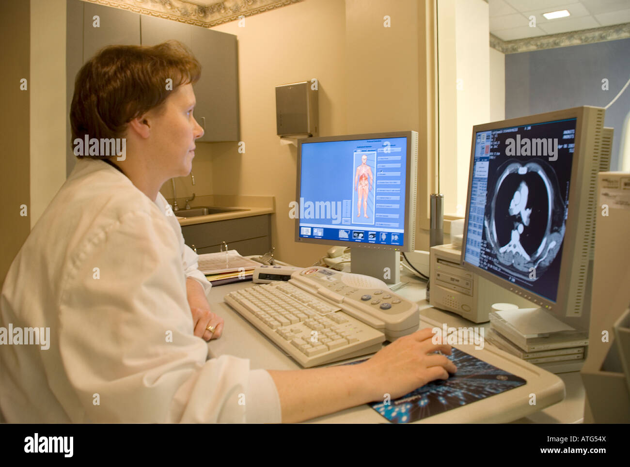 Operating computers hi-res stock photography and images - Alamy