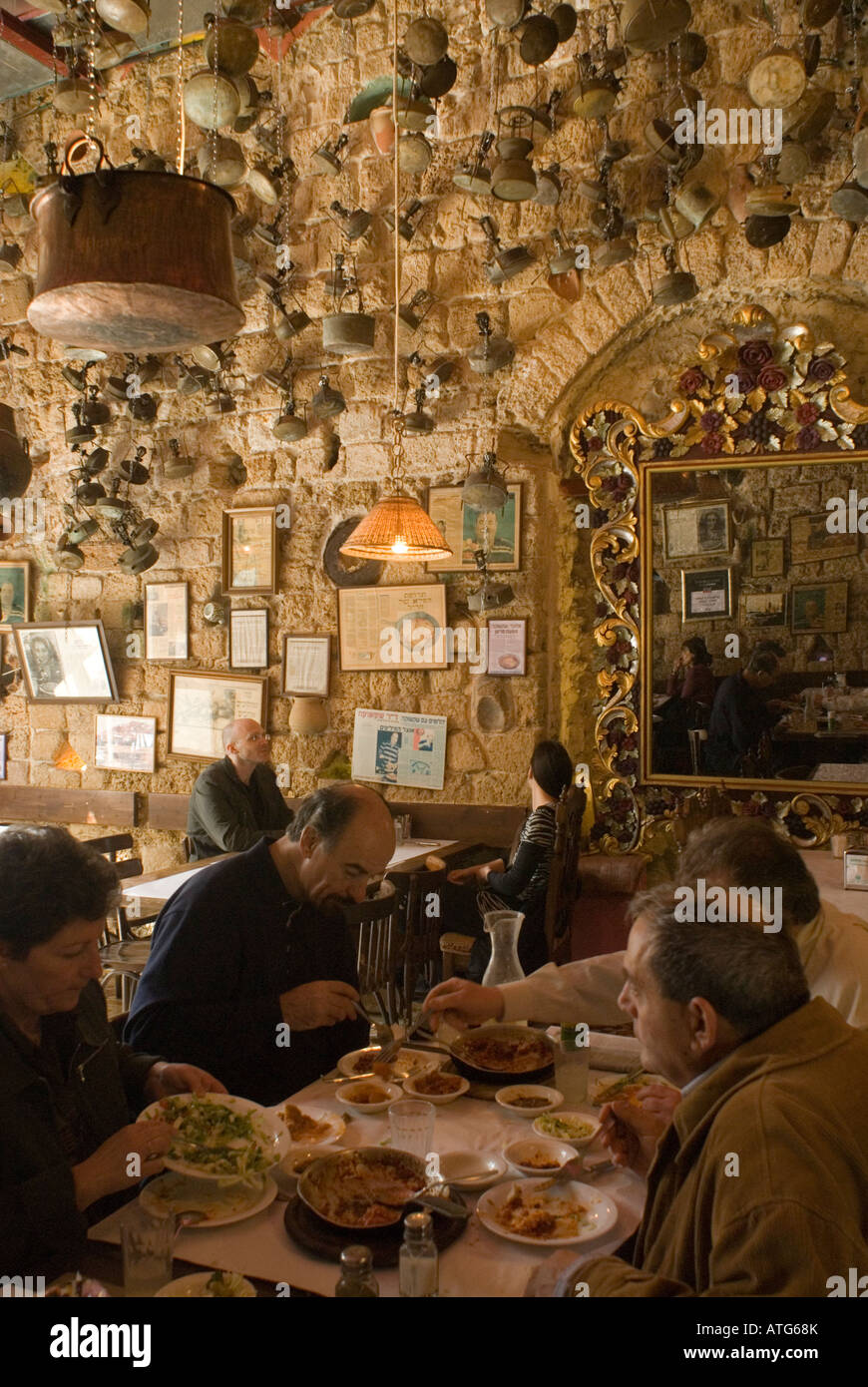 People eat in "Dr Shakshuka" a restaurant serving traditional Libyan ...
