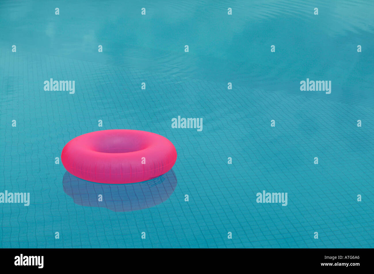 pink rubber ring in pool Stock Photo - Alamy