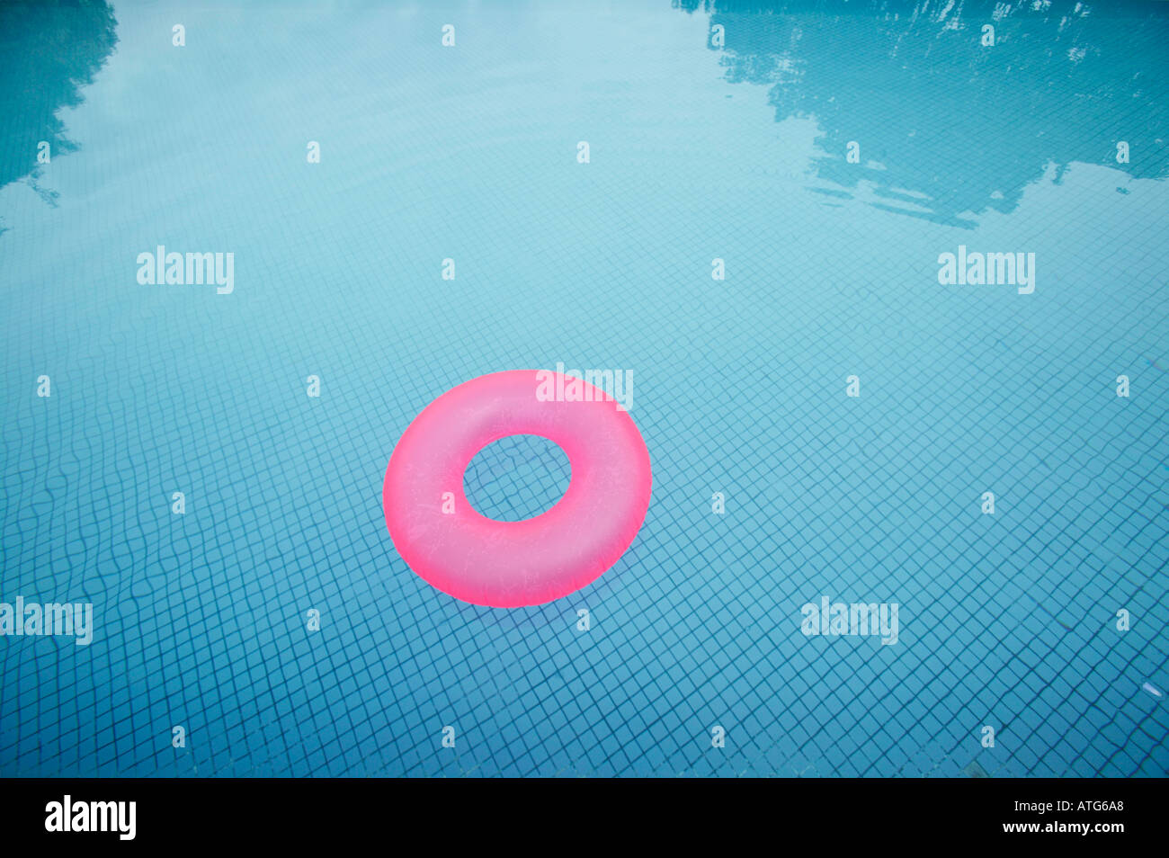 pink rubber ring in pool Stock Photo - Alamy
