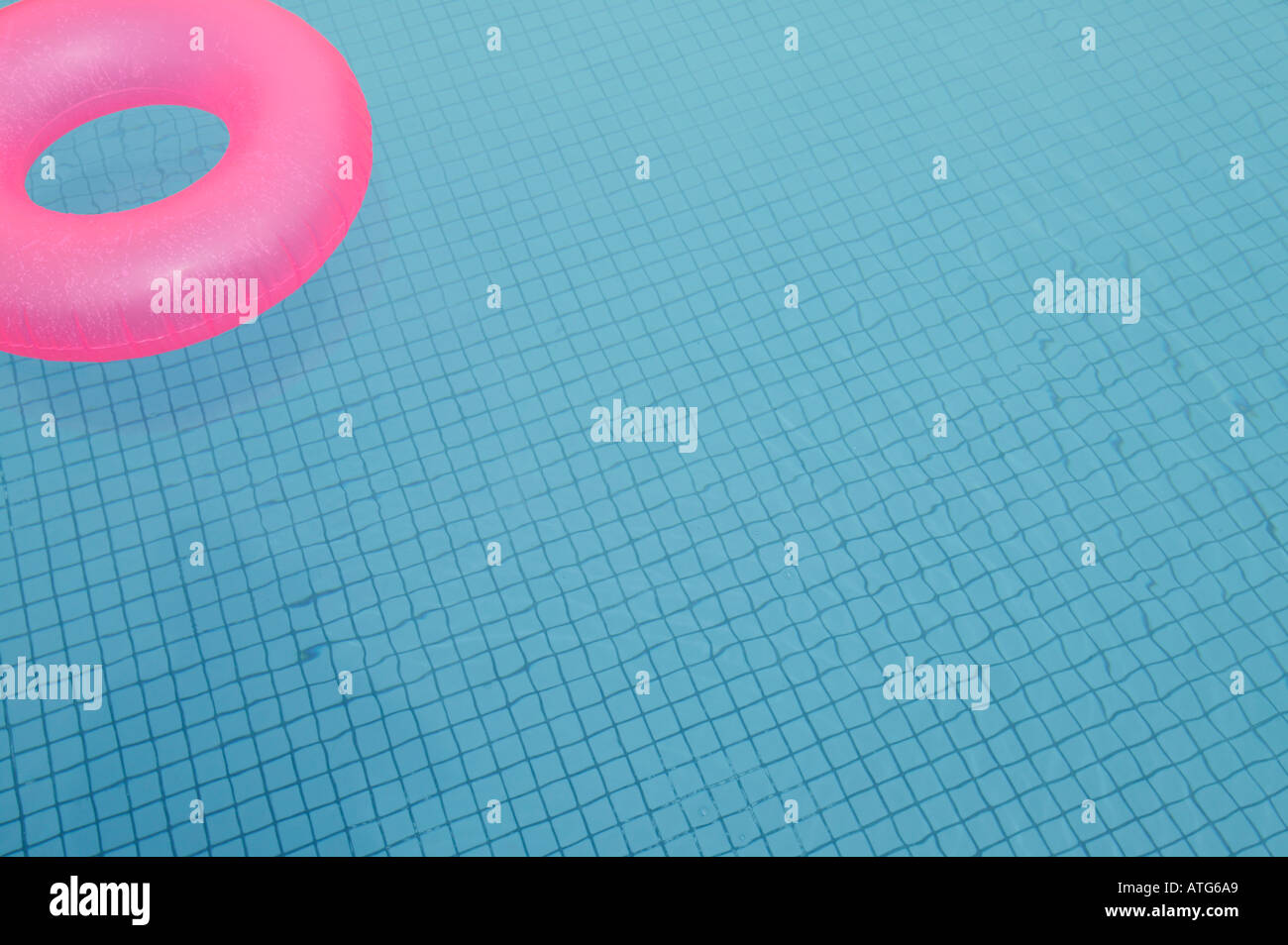 pink rubber ring in pool Stock Photo - Alamy