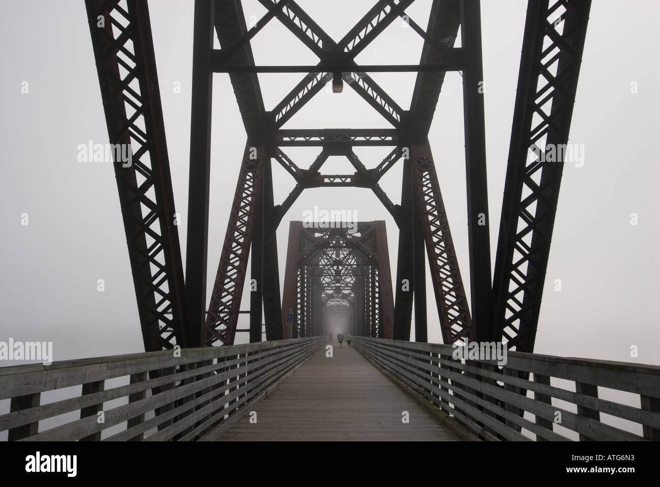 Stock image of a steel train bridge used as a walking trail during a ...